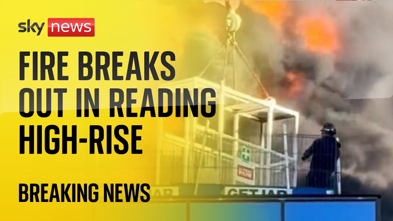 Worker rescued by crane as large fire breaks out at high-rise building ...