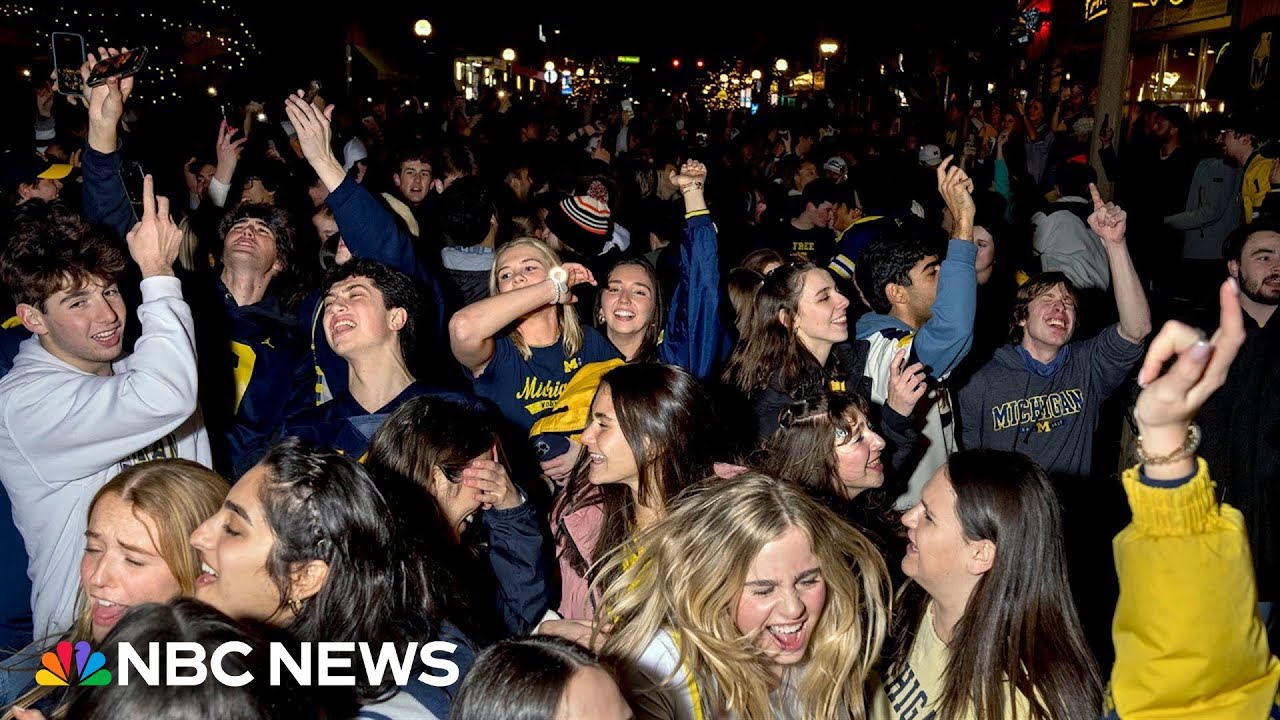 Michigan Wolverines fans celebrate after winning college football ...
