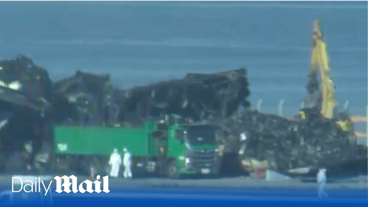 LIVE: Japan aircraft wreckage to be removed following airport collision ...